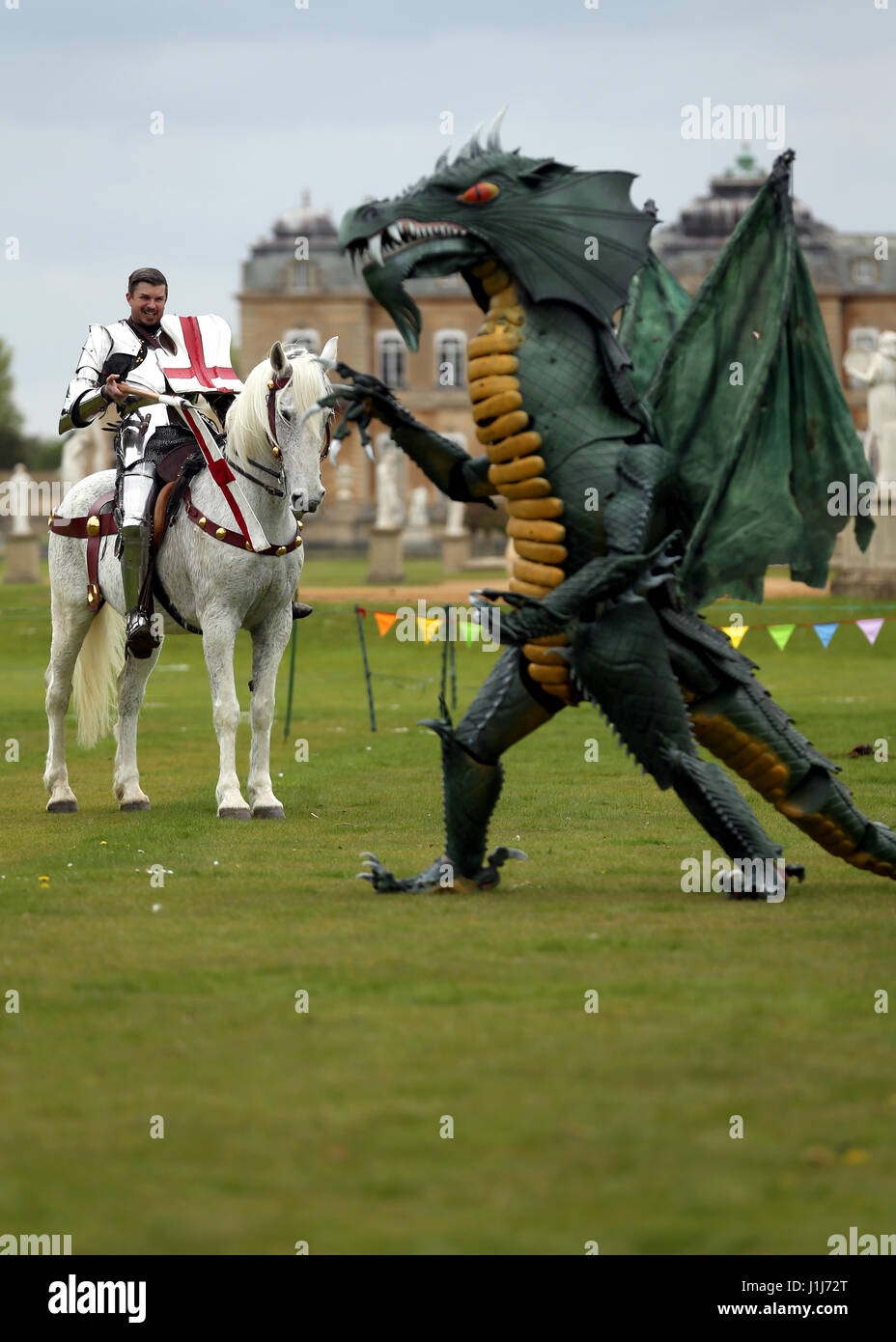 Performers act out the legend of St George and the dragon during a ...