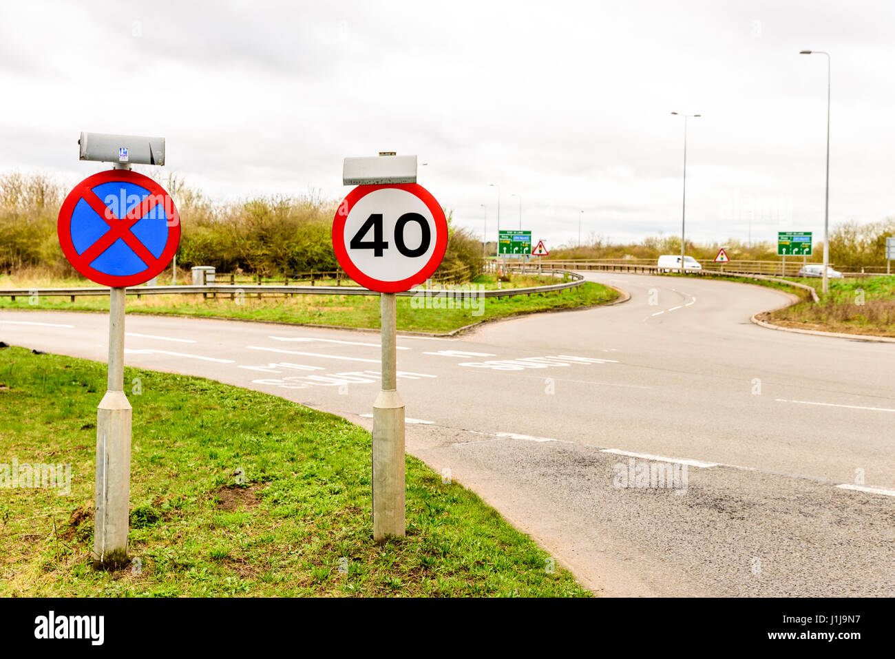 Day view background of UK Motorway Road 40 Speed Limit Stock Photo - Alamy