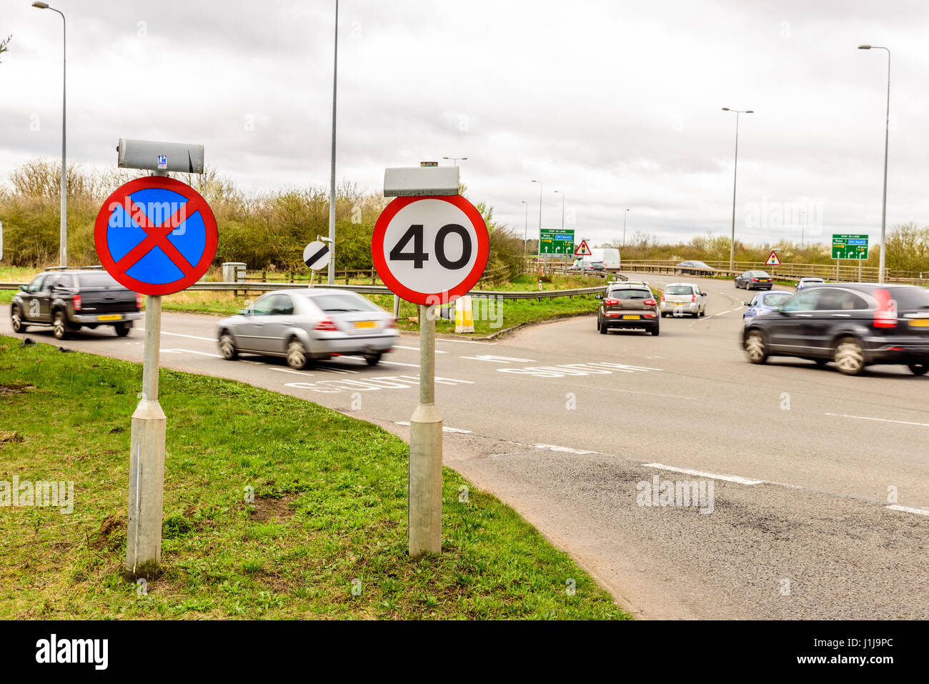 Day view background of UK Motorway Road 40 Speed Limit Stock Photo - Alamy