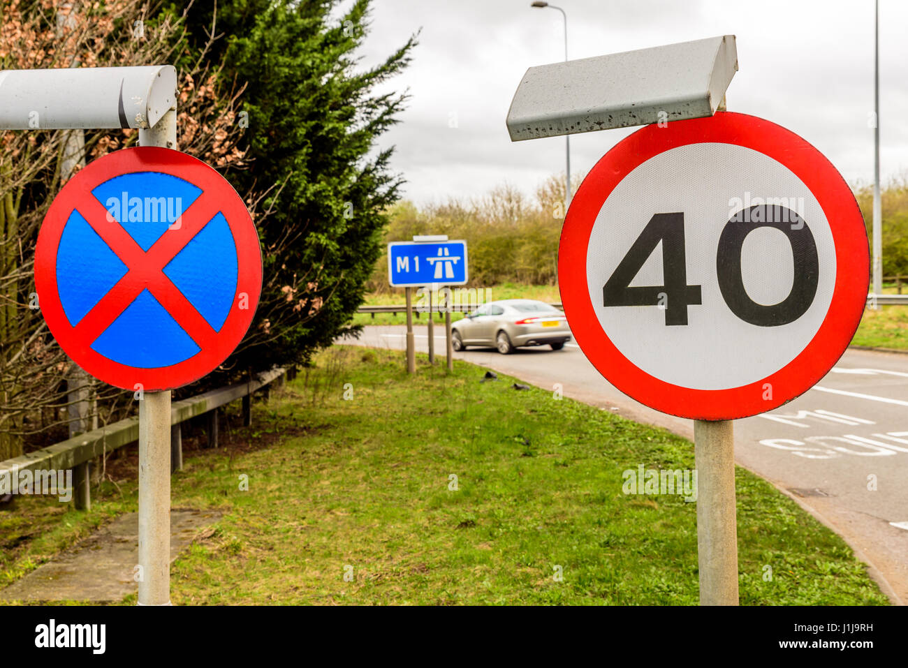 Day view background of UK Motorway Road 40 Speed Limit Stock Photo - Alamy