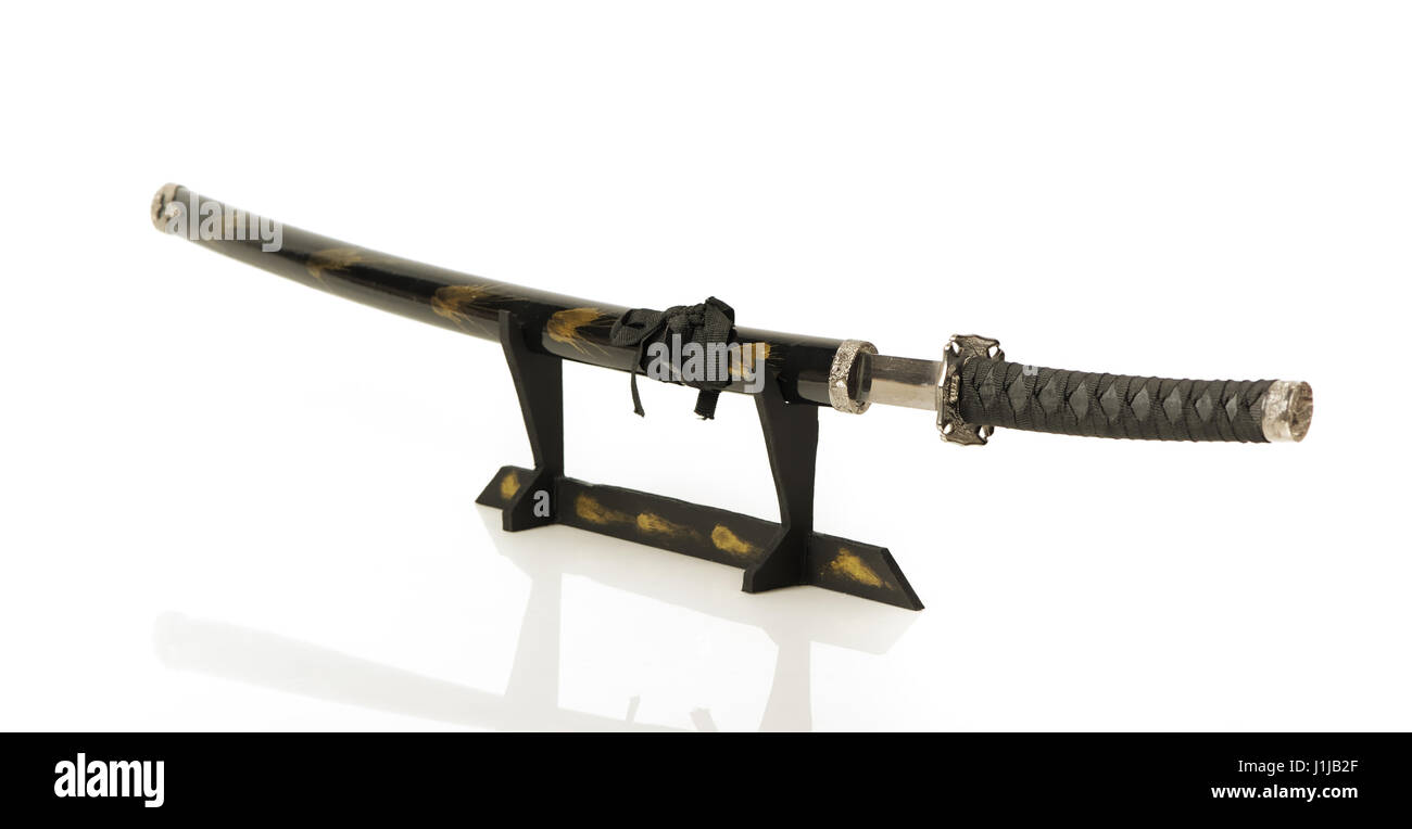 Samurai sword on a stand isolated Stock Photo - Alamy