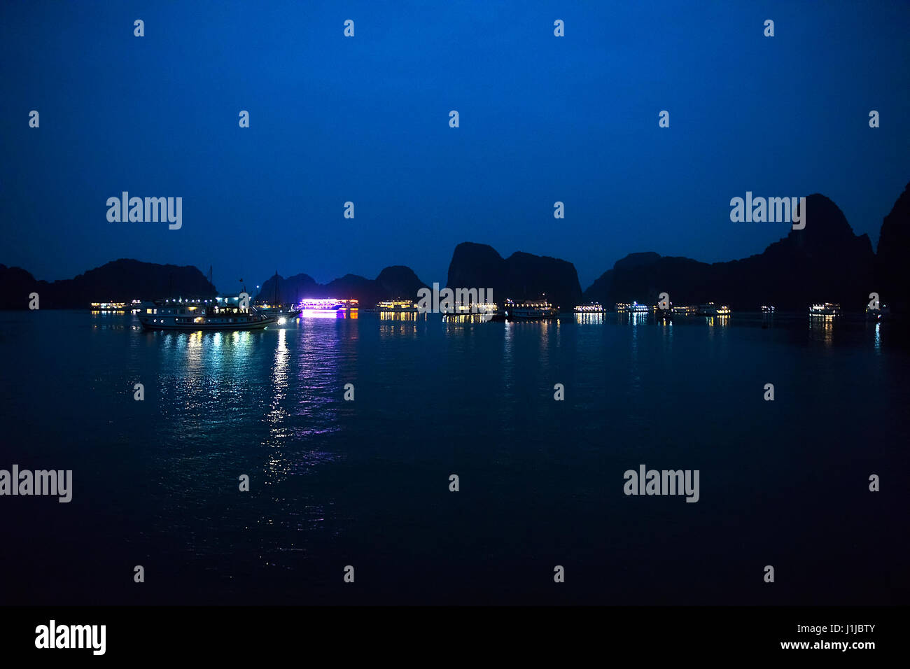 View at Ha Long Bay in Vietnam at night Stock Photo - Alamy
