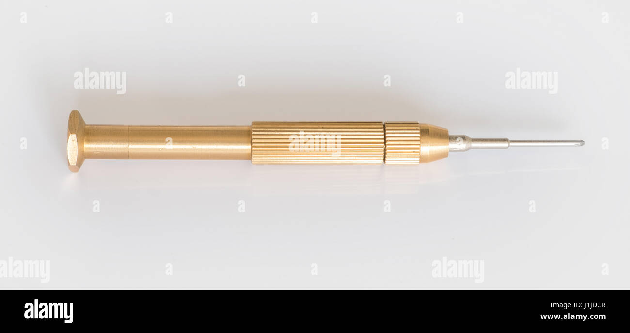 golden mini screw driver isolated - metal screwdriver Stock Photo - Alamy