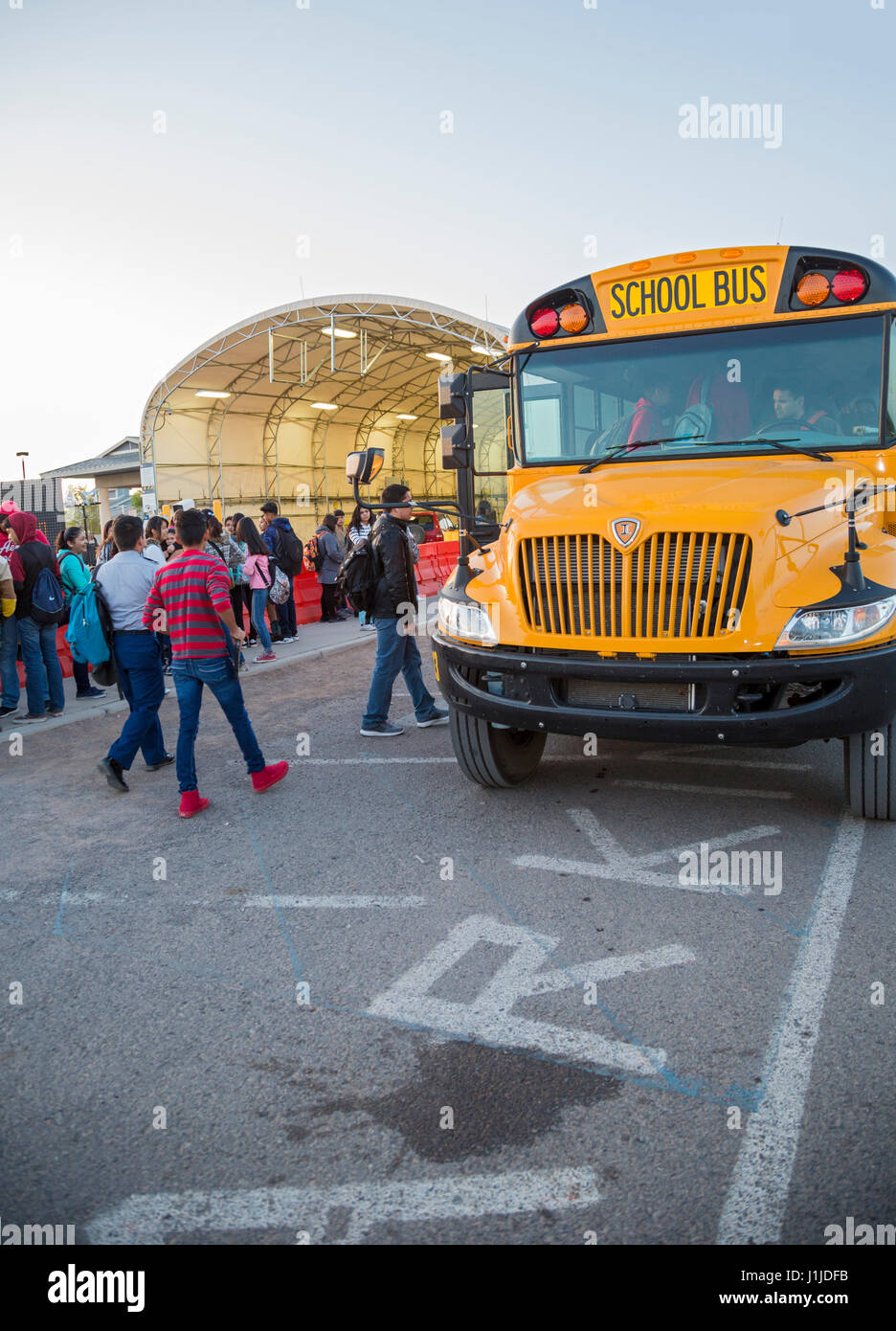 Teens school bus hi-res stock photography and images - Alamy