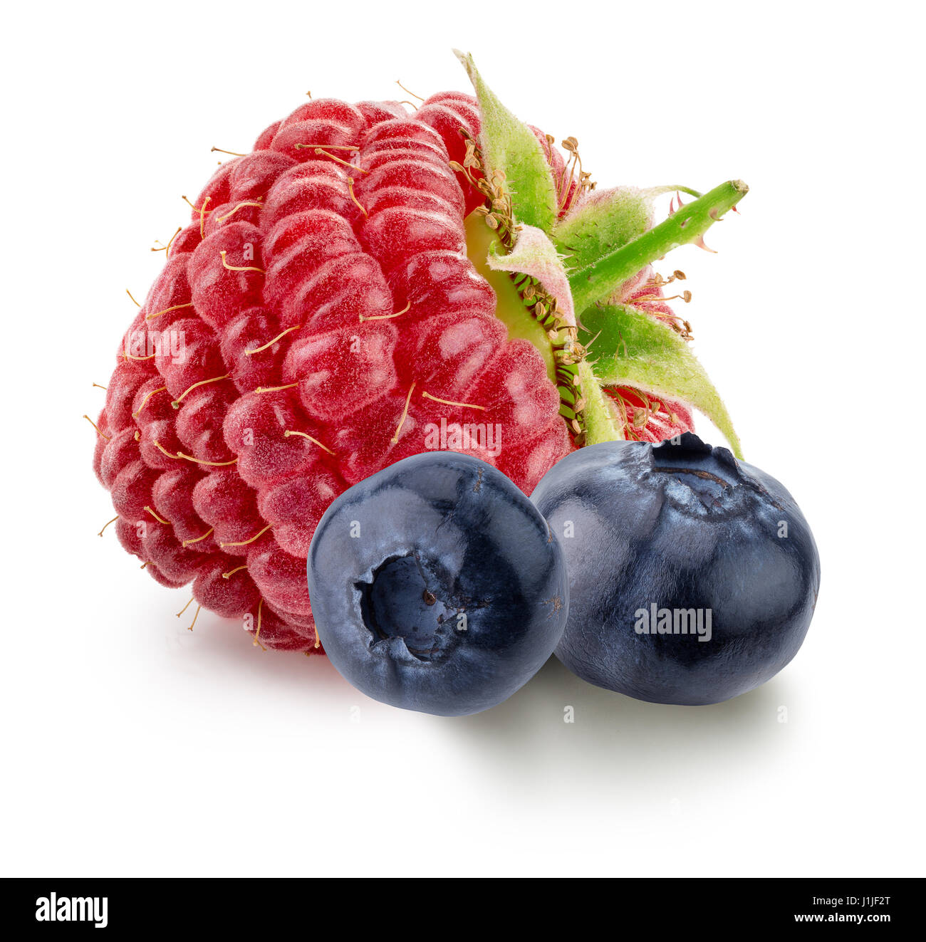 raspberry and blueberries isolated on white background Stock Photo - Alamy