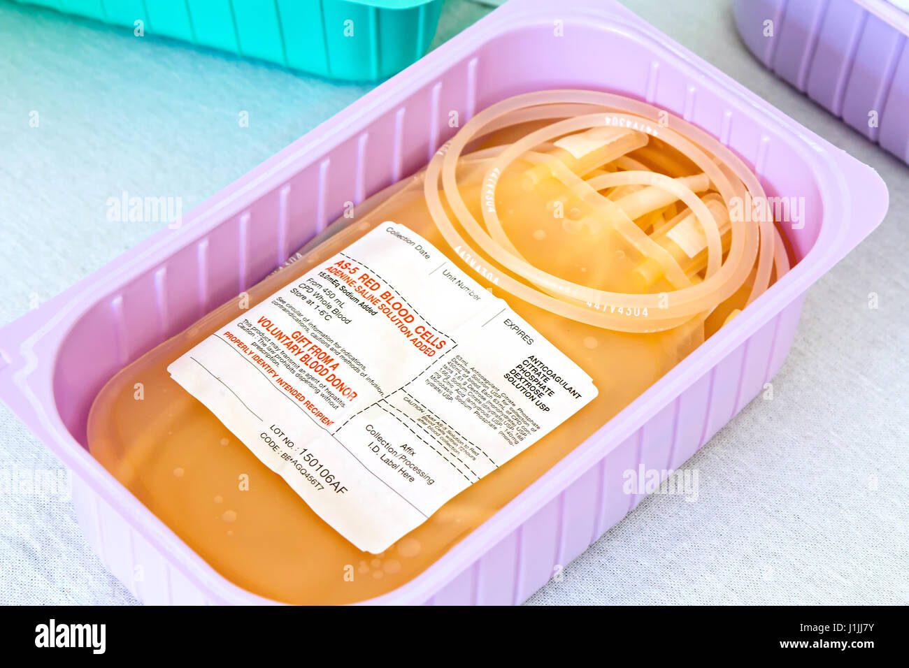 Empty blood bag in basket Stock Photo - Alamy