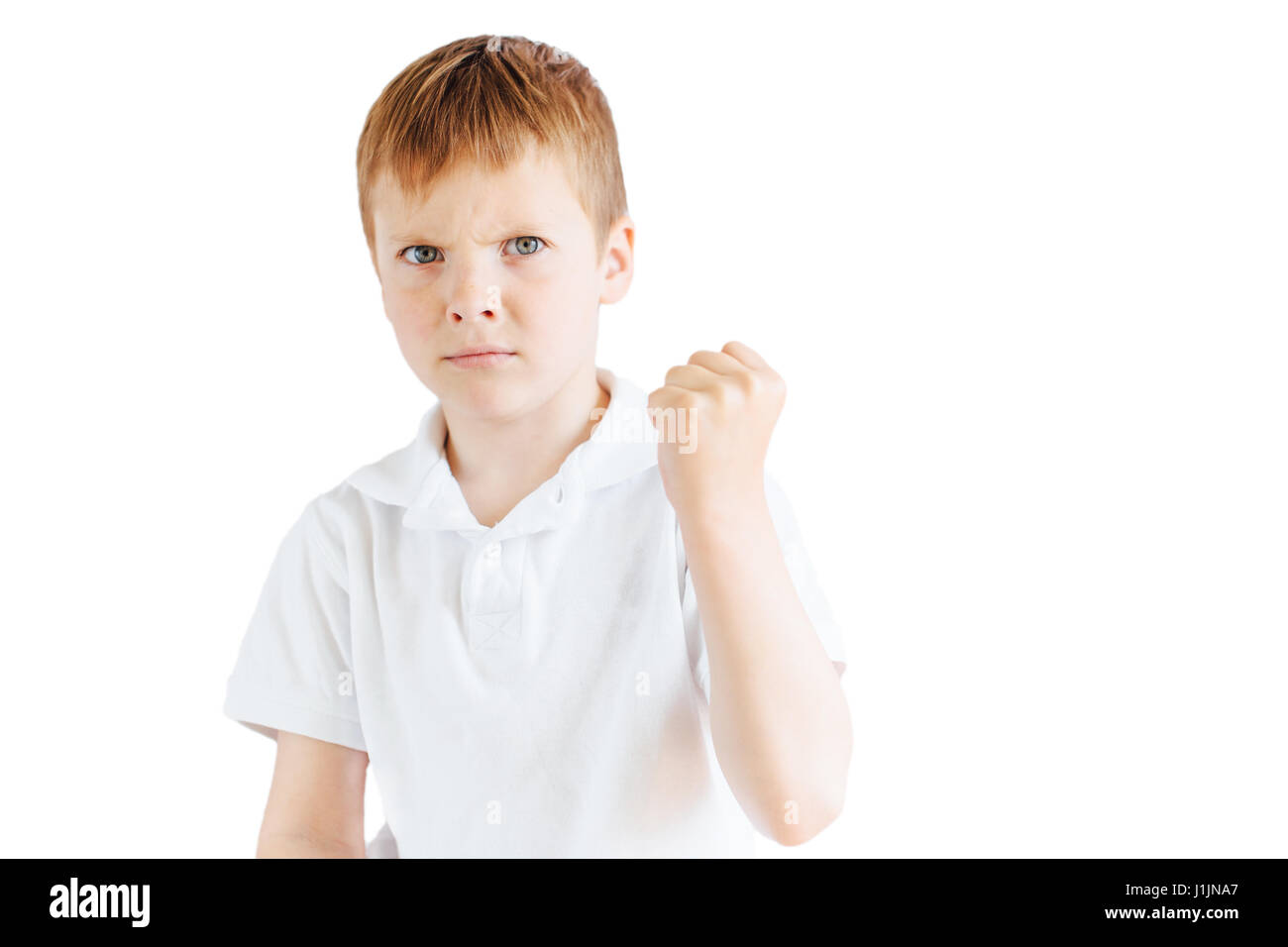 Little boy stand on white background and show his emotions Stock Photo ...