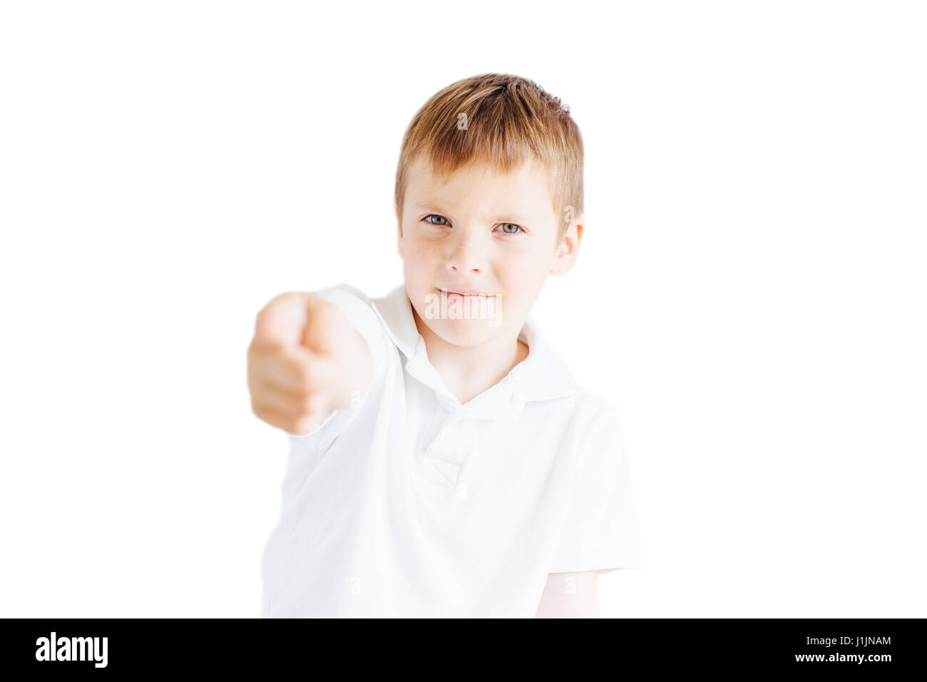 Little boy stand on white background and show his emotions Stock Photo ...
