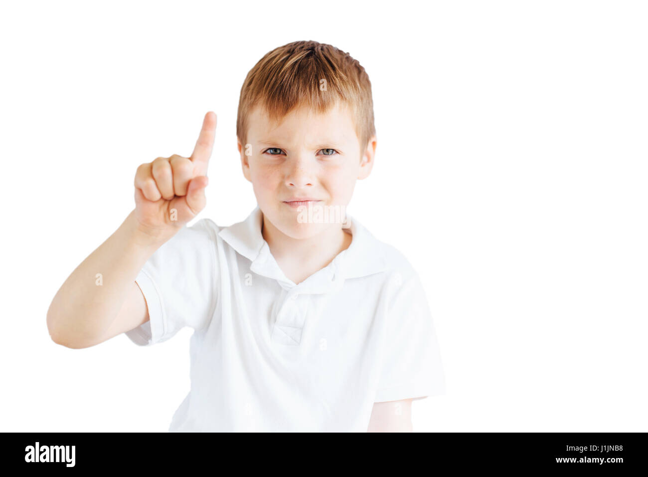 Little boy stand on white background and show his emotions Stock Photo ...