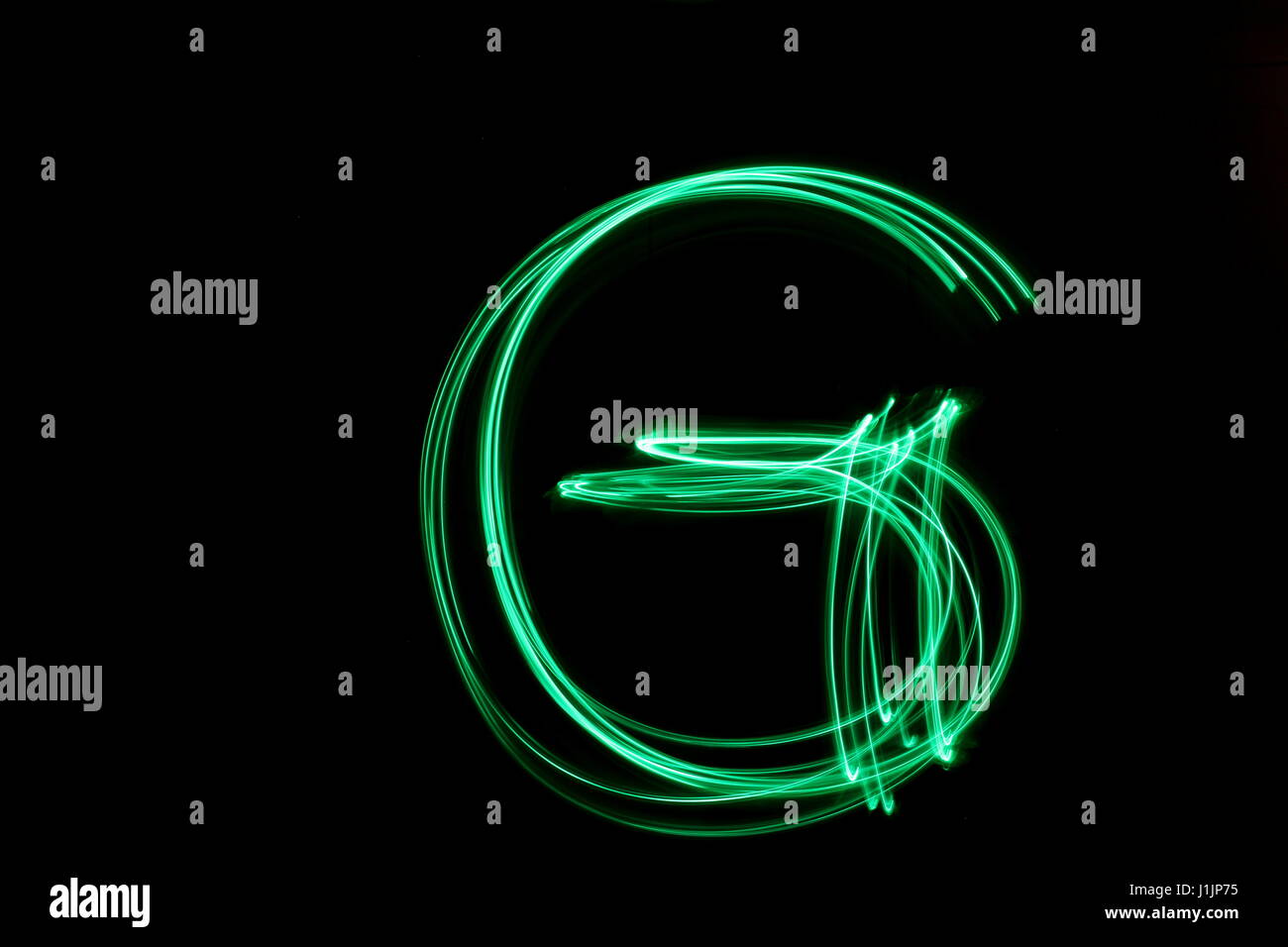 Green Light Painting Photography - letter G of alphabet series on a ...