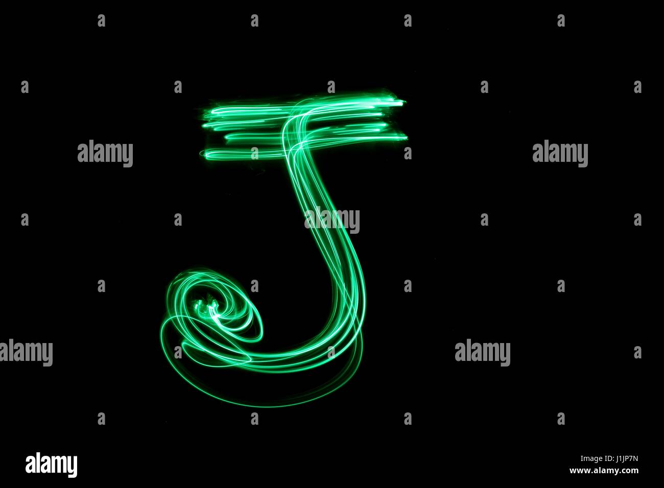 Green Light Painting Photography - letter J of alphabet series on a ...