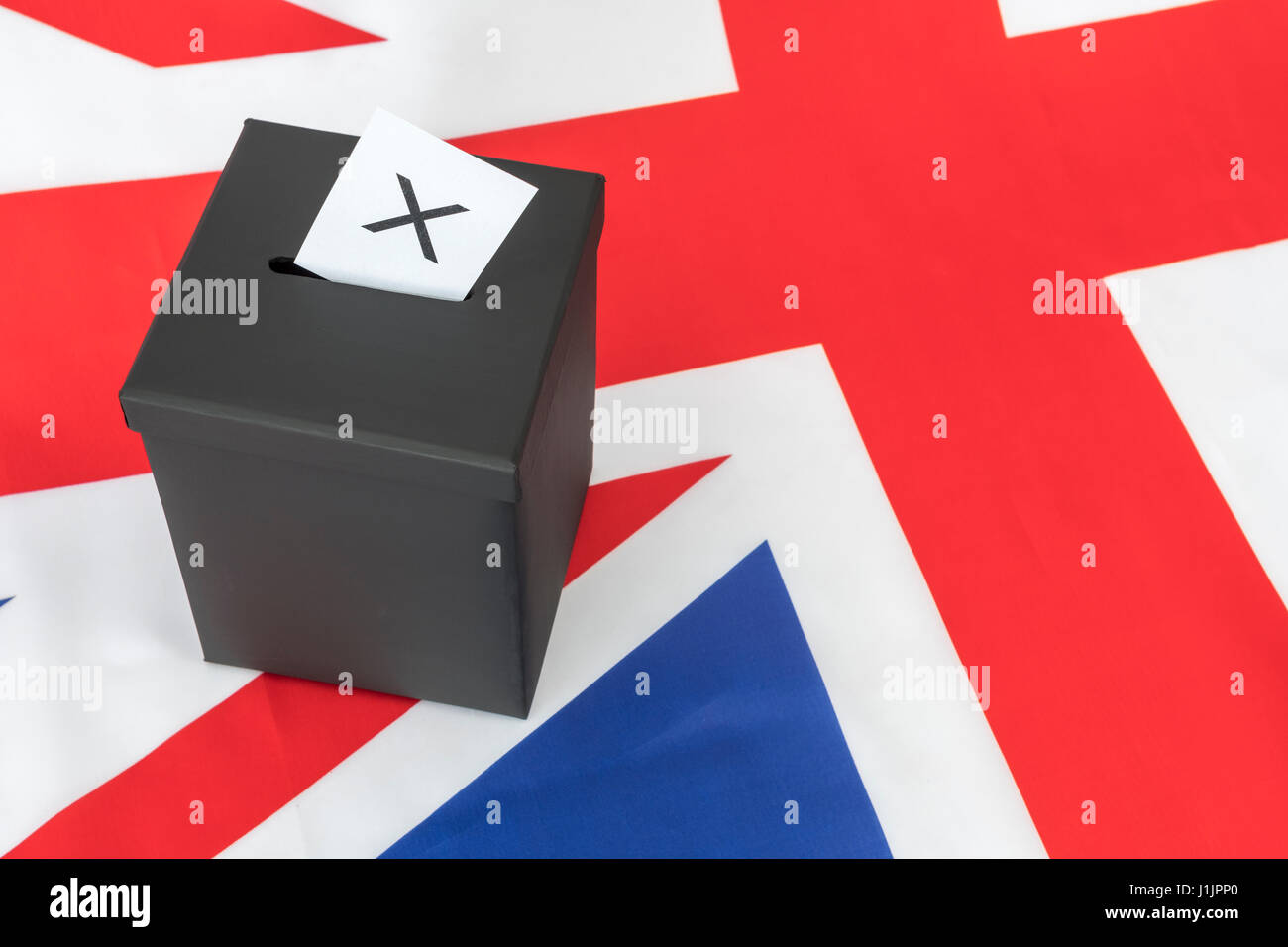 Replica black ballot box set against UK flag / Union Jack as metaphor ...