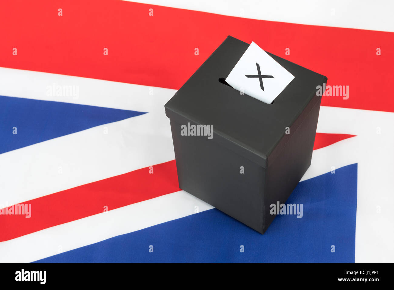 Replica black ballot box set against UK flag / Union Jack as metaphor ...