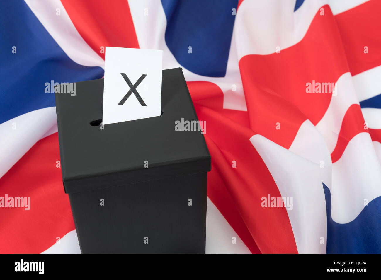 Replica black ballot box set against UK flag / Union Jack as metaphor ...