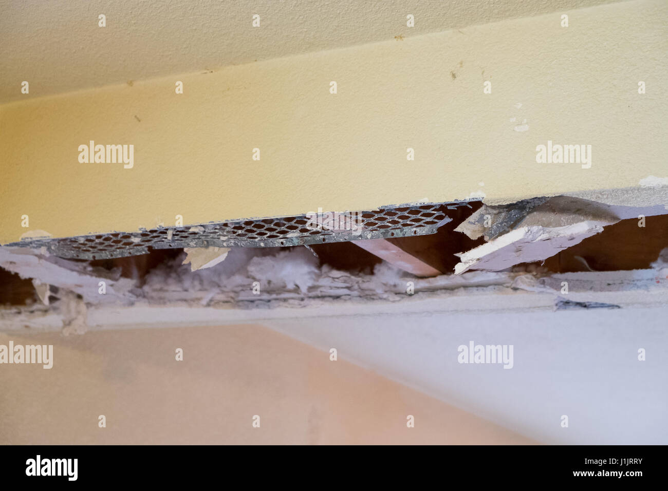 Major mess from a soffit demo during a home renovation and remodel in a ...