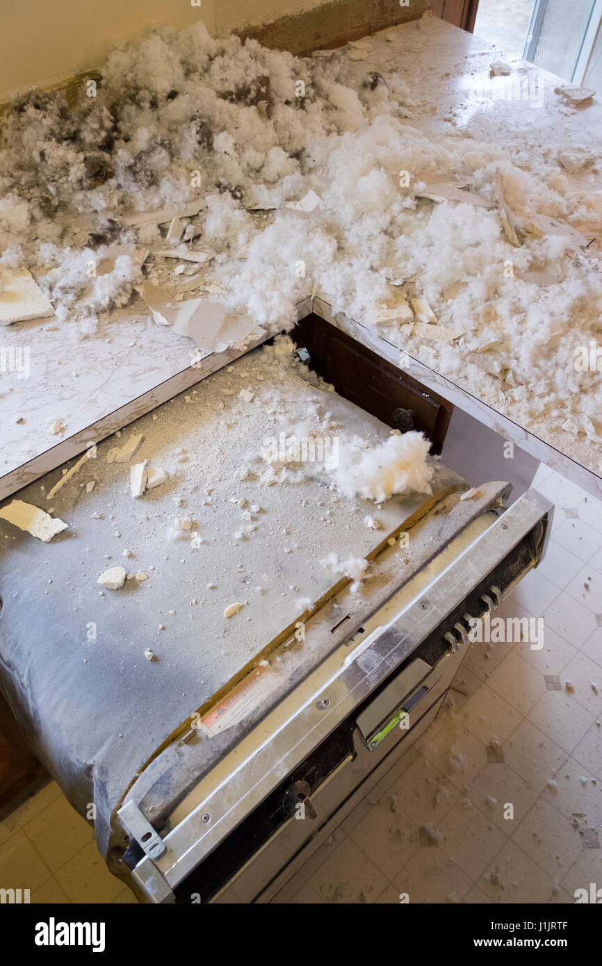 Major mess from a soffit demo during a home renovation and remodel in a ...