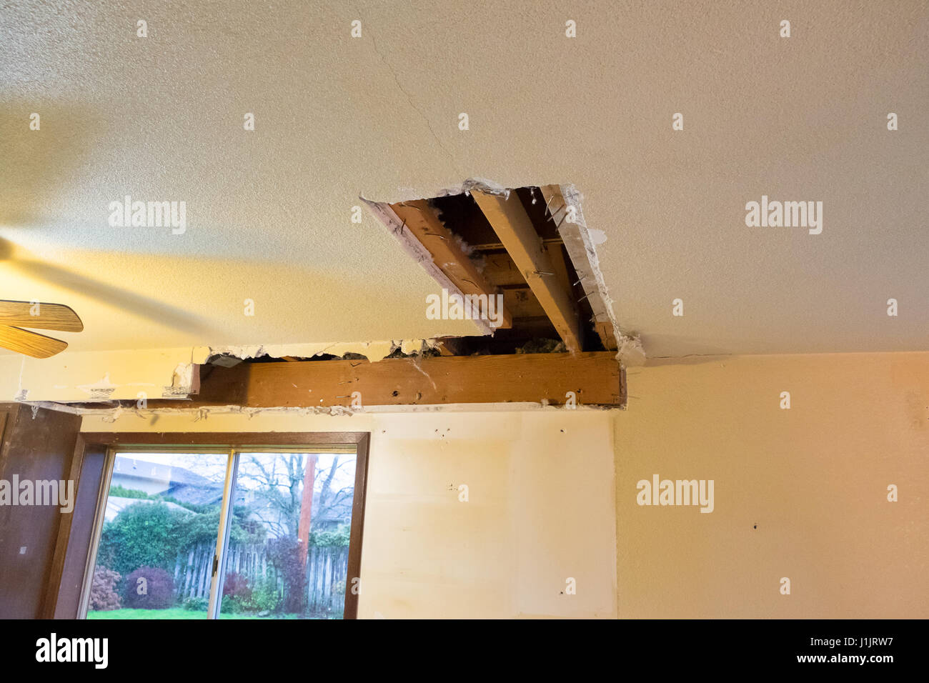 Major mess from a soffit demo during a home renovation and remodel in a ...