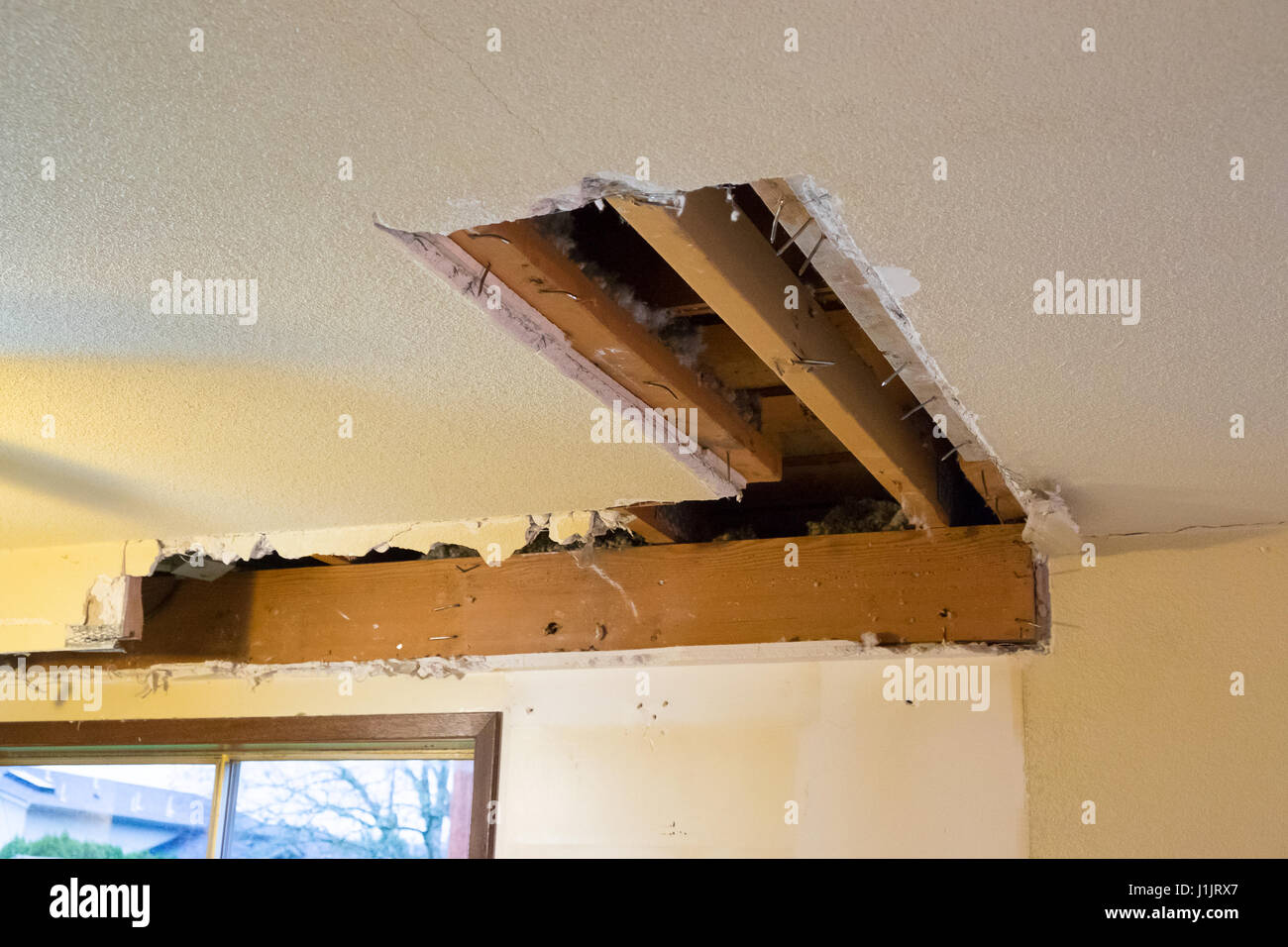 Major mess from a soffit demo during a home renovation and remodel in a ...