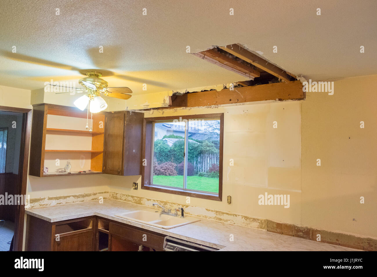 Major mess from a soffit demo during a home renovation and remodel in a ...
