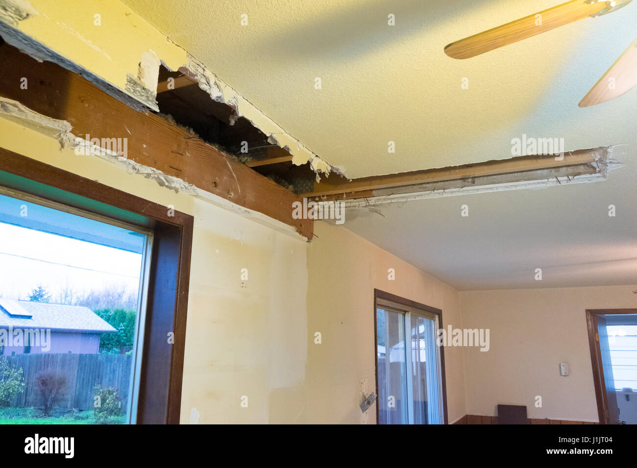Major mess from a soffit demo during a home renovation and remodel in a ...