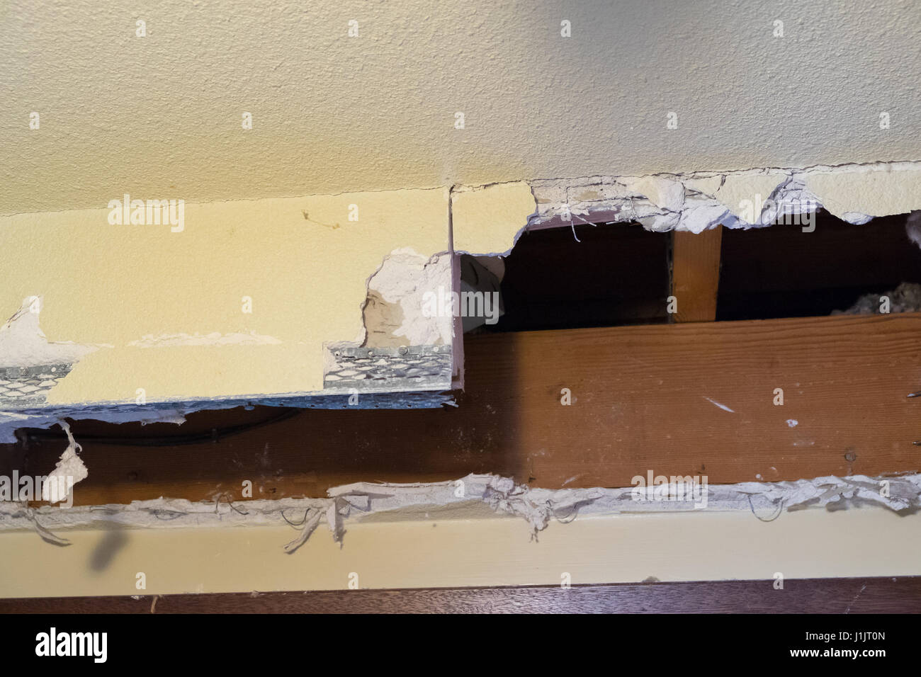 Major mess from a soffit demo during a home renovation and remodel in a ...