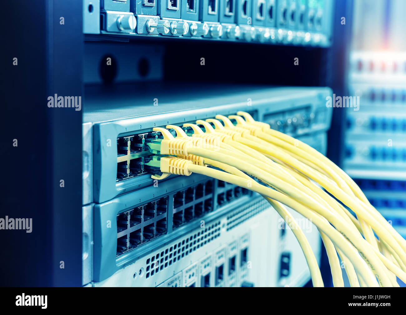 Network panel, switch and cable in data center Stock Photo - Alamy