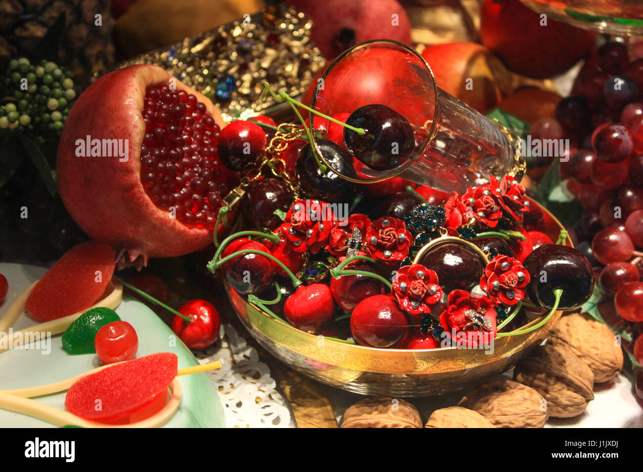 Mix red fruits, bowl of cherries, grapes, pomegranate and some fashion ...