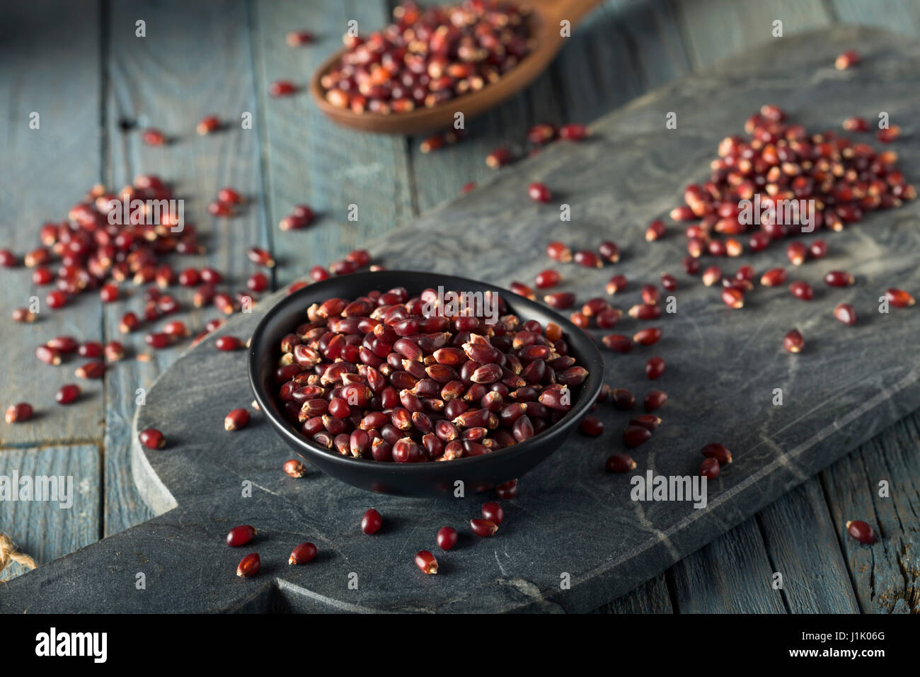 Raw Organic Ruby Red Pop Corn in a Bowl Stock Photo - Alamy