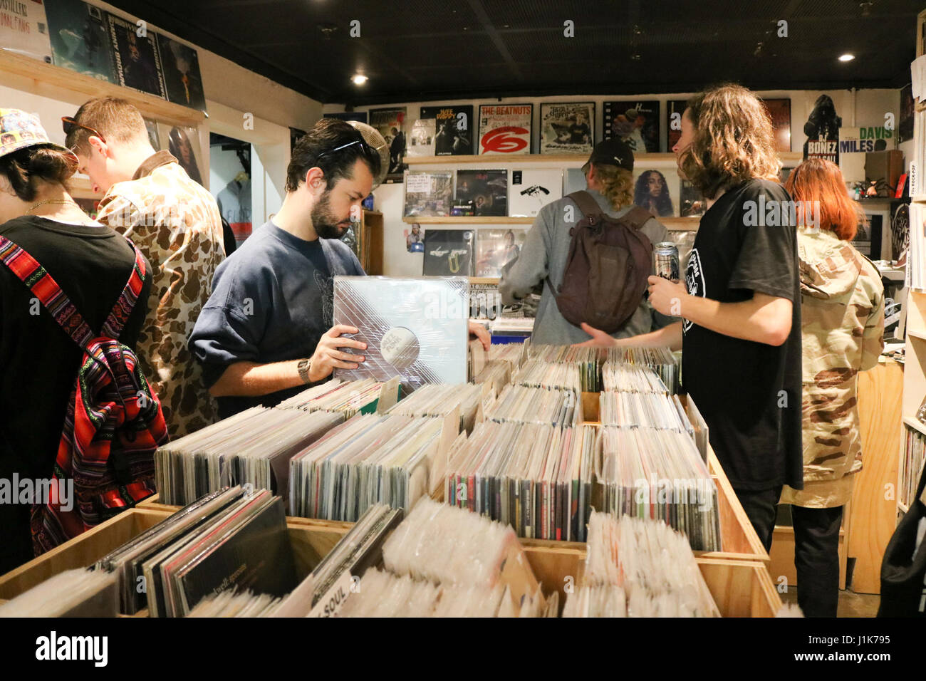 Browsing in record shops hi-res stock photography and images - Alamy