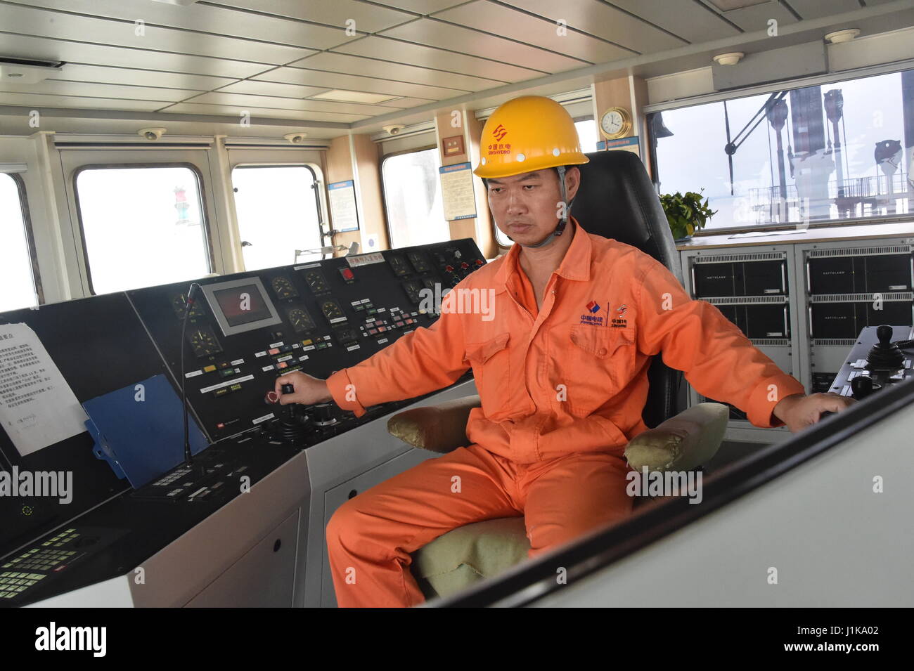 Dhaka. 21st Apr, 2017. A Chinese technician operates a heavy machine at ...