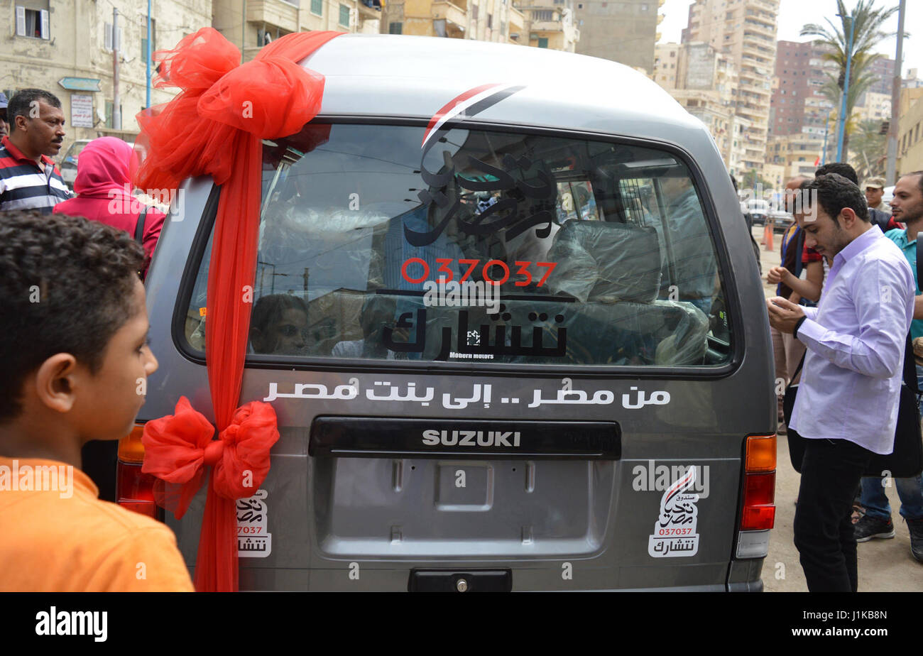 Cairo, Egypt. 22nd Apr, 2017. Egypians stand next to a mini-bus before ...