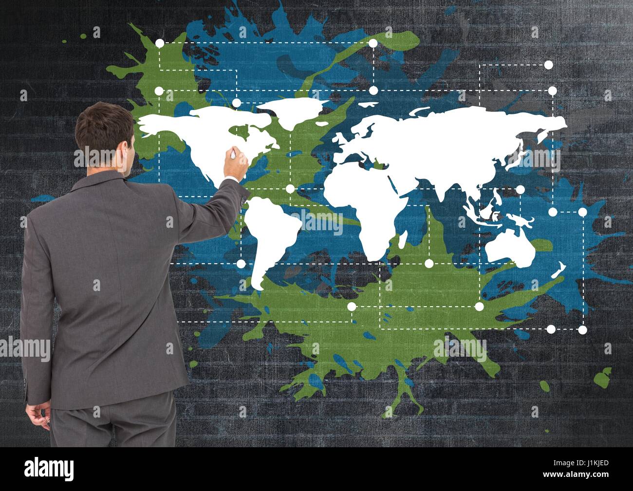 Digital composite of Businessman drawing on Colorful Map with paint ...
