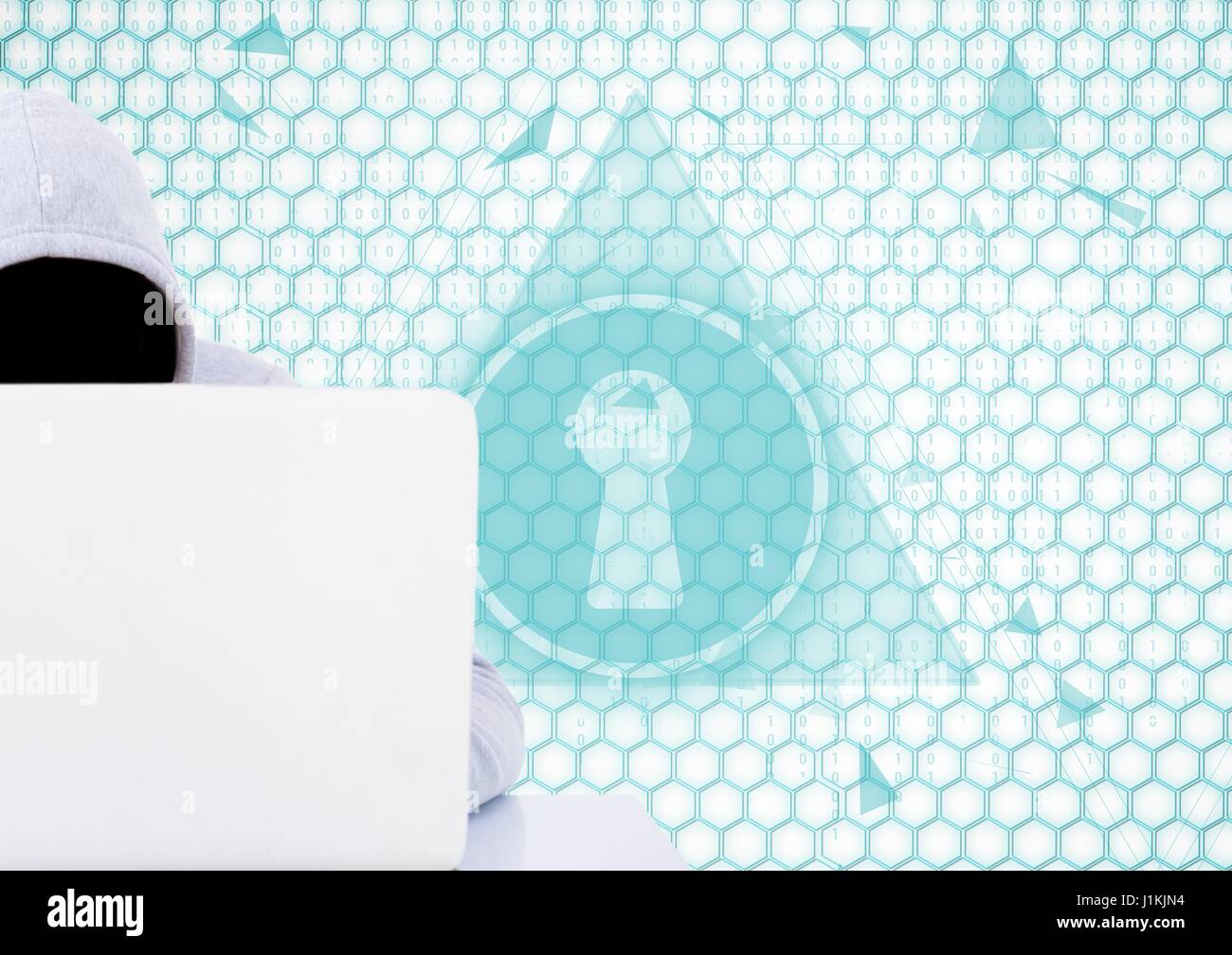 Computer hacker in hoodie obscured hi-res stock photography and images ...