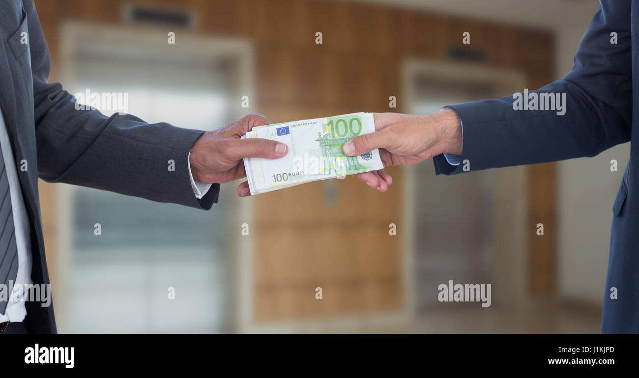 Digital composite of Hands holding money representing corruption ...