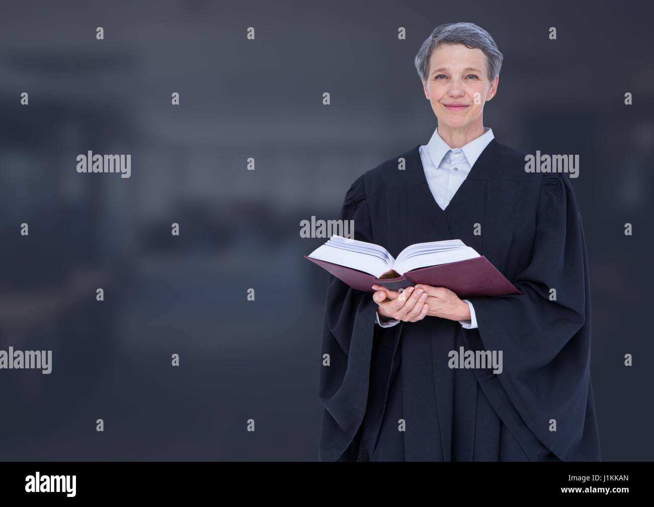 Digital composite of Judge holding book in front of dark office ...