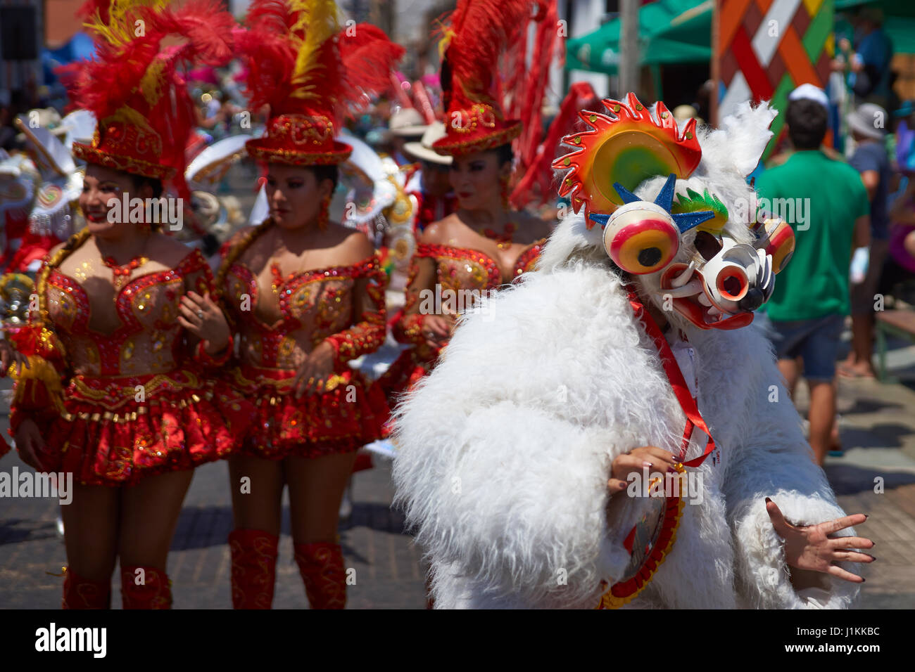 Morenada Dance Group performing during a street parade at the annual ...