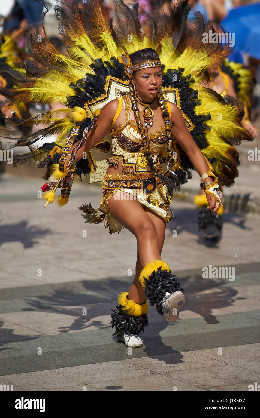 Tobas dancer in ornate costume performing at the annual Carnaval Andino ...