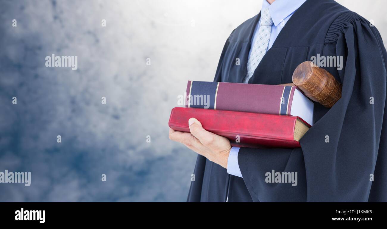 Digital composite of Judge holding book in front of sky clouds Stock ...
