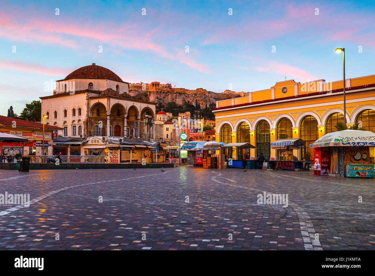 Acropolis and the old mosque in Monastiraki square in the old town of ...