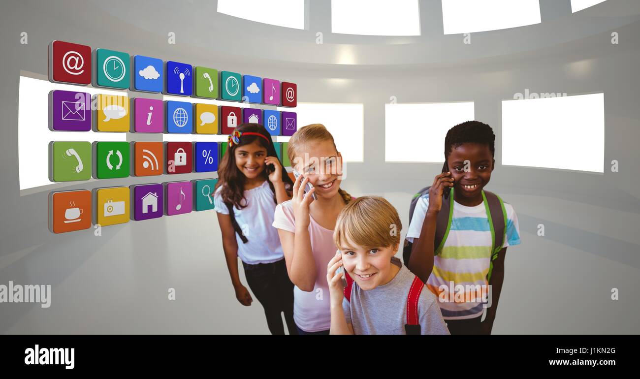 Digital composite of School children using mobile phone by app icons ...