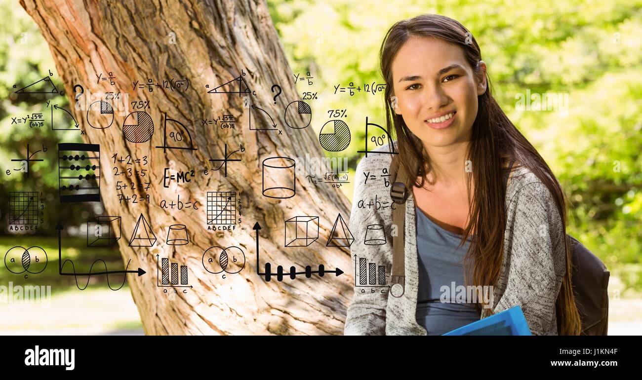 Digital composite of University student with math equations in campus ...
