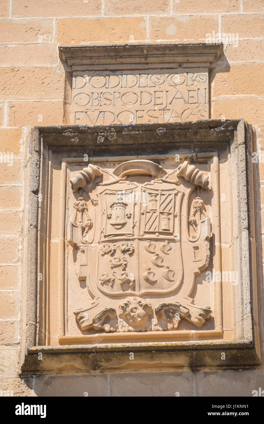 Stone shield on the main facade of the Hospital de Santiago, Ubeda ...