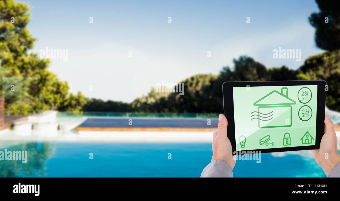 Digital composite of Cropped image of person using smart home app on ...