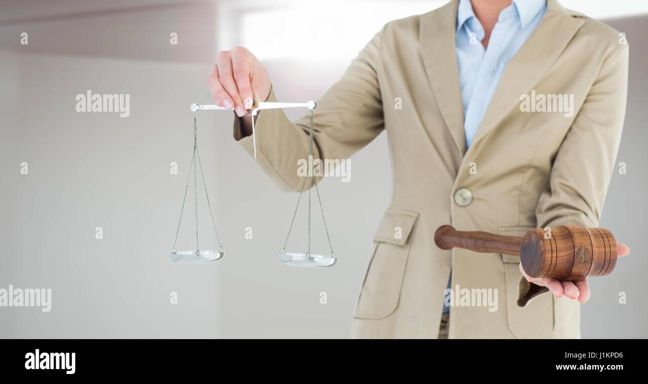 Digital composite of Judge with balance scale and hammer in front of ...