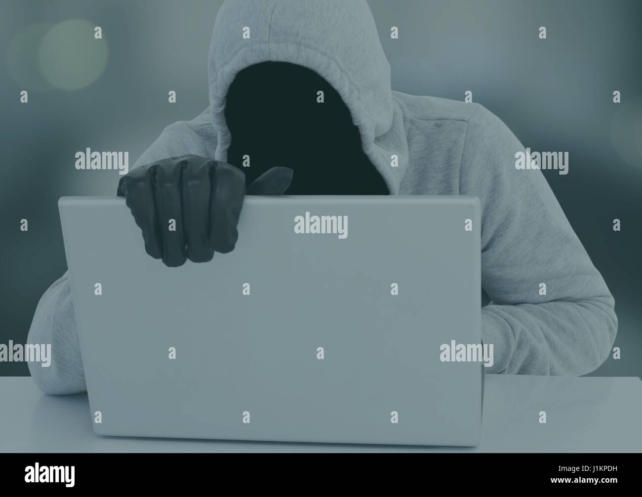Digital composite of Light grey jumper hacker with out face doing ...