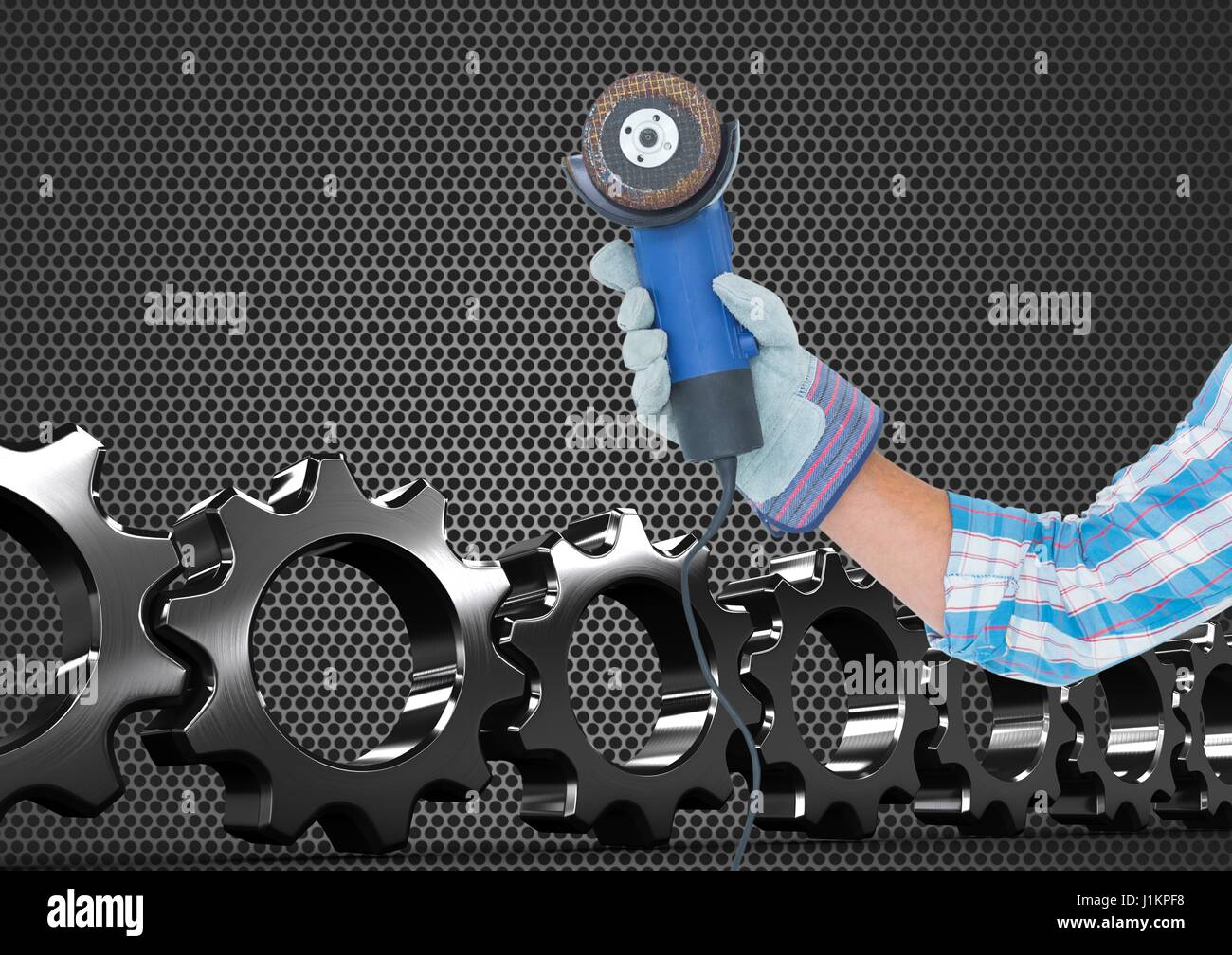Digital composite of hand with tool with metal and cogs background ...