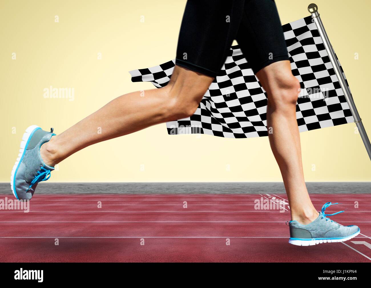 Digital composite of Runner legs on track against yellow background and ...
