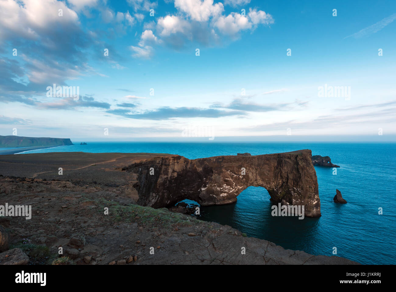 Unique basalt arch on Dyrholaey Nature Reserve, Iceland Stock Photo - Alamy