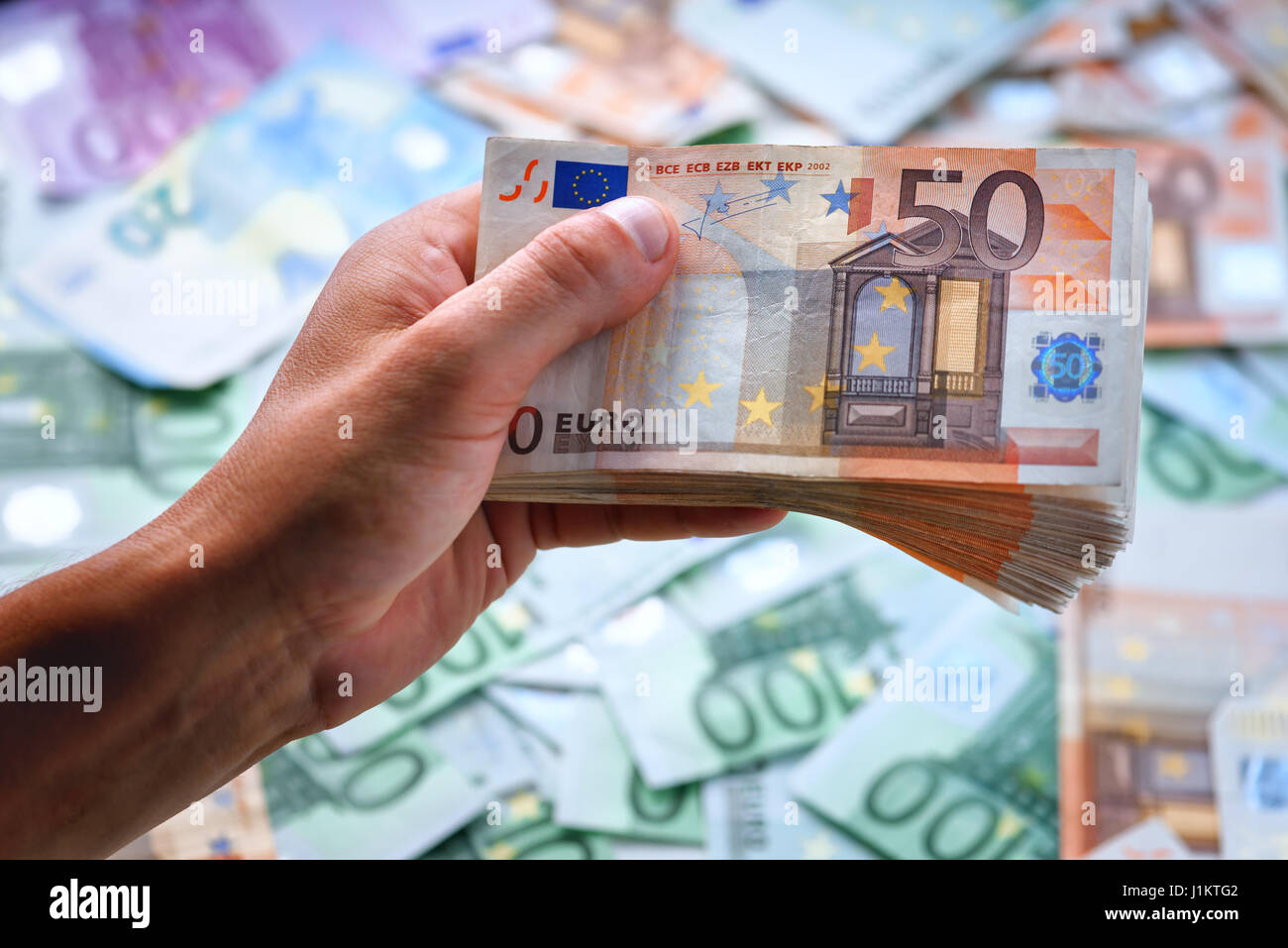 Money cash in hand hi-res stock photography and images - Alamy