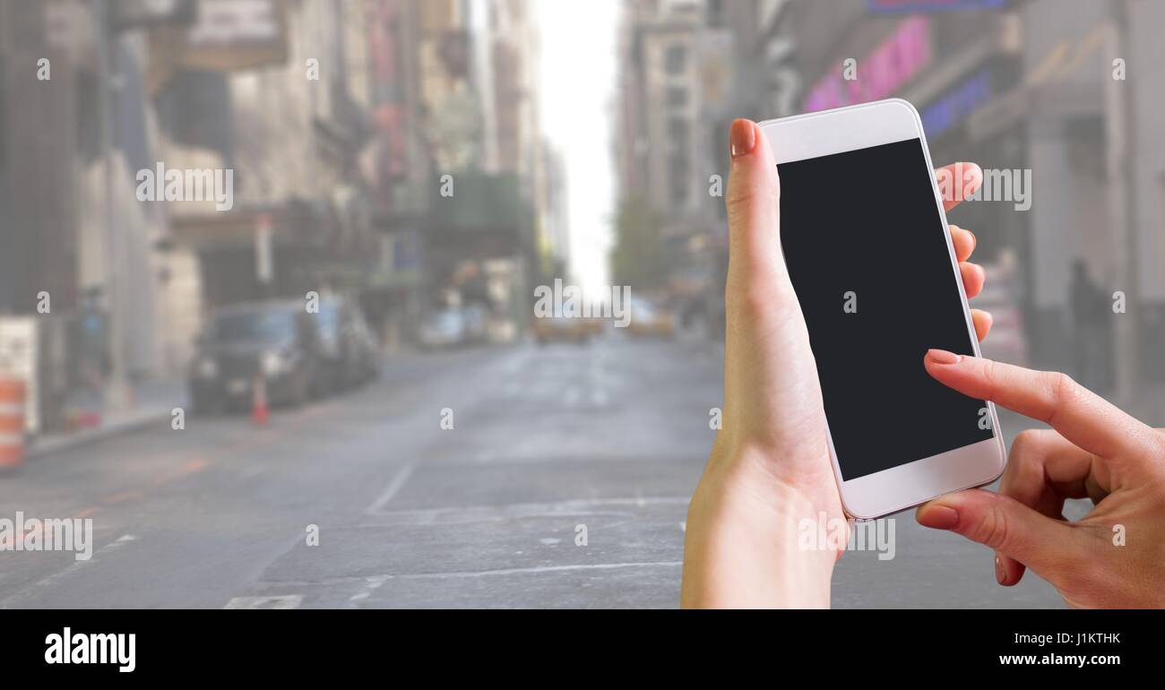 Digital composite of Cropped image of hands using smart phone with ...